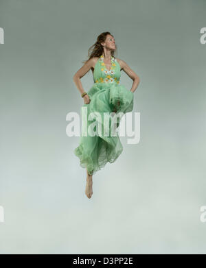 Humans floating frozen in mid air Stock Photo - Alamy