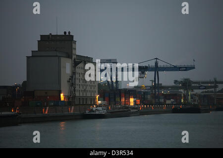 Container terminal in the port of Mannheim, sea containers are stacked ...