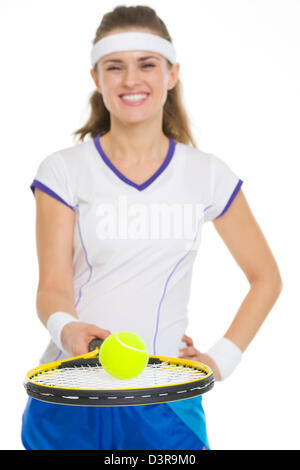 Closeup on tennis player balancing ball on racket Stock Photo - Alamy