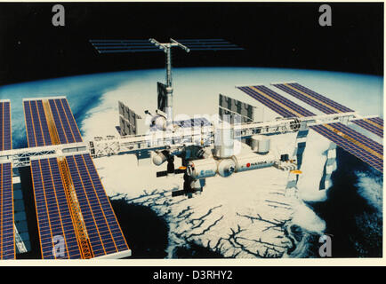 A glossy photo of the International Space Station, showcasing its ...