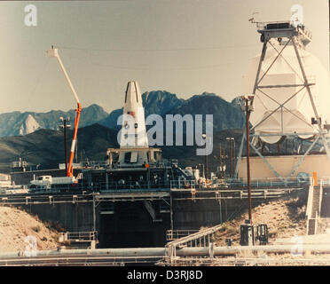 A glossy photo of the McDonnell Douglas Delta rocket, a key vehicle ...