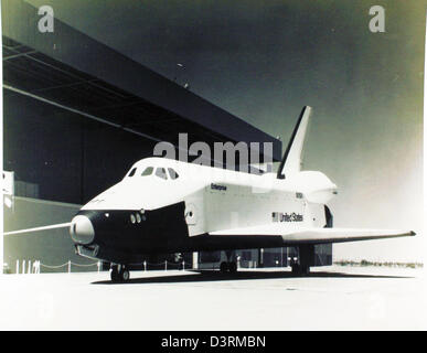A glossy photo commemorating the Space Shuttle Program, which operated ...