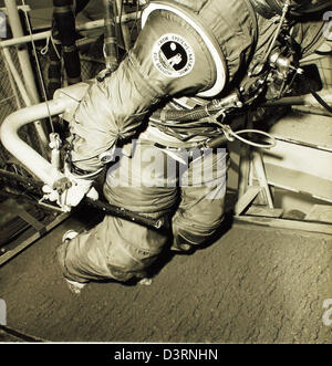NASA space suits provide life support, mobility, and protection for ...