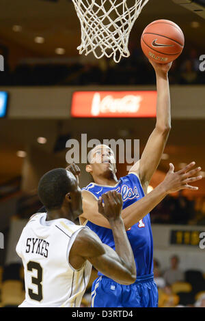 Tulsa forward Brandon Swannegan (44) and William & Mary forward Sean ...
