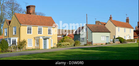 Mixed housing types in village residential street Stock Photo - Alamy