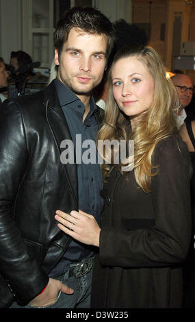 Swiss singer Patrick Nuo (R) and his wife Molly poses for the cameras ...