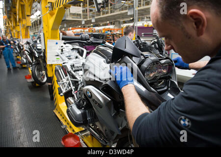 Berlin, Germany. 25th Feb, 2013. Employee assemble motorcycles at the ...