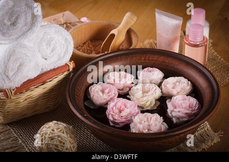 Spa with roses, manicure, relaxing bath and cosmetics Stock Photo - Alamy