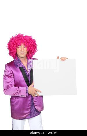 Man wearing a wig and pink dress Bakewell carnival parade an annual ...