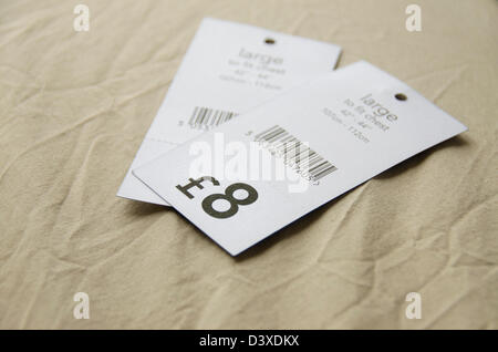 Pound price tags for upper body clothes, England, United Kingdom ...