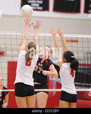 Girls high school volleyball game in a high school gym Stock Photo - Alamy