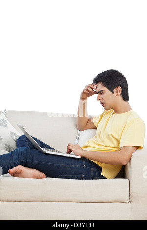 Stressed man with Laptop Stock Photo - Alamy