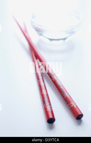 Still Life of Pair of Red Chopsticks Rice Table Plate Japanese Chinese ...