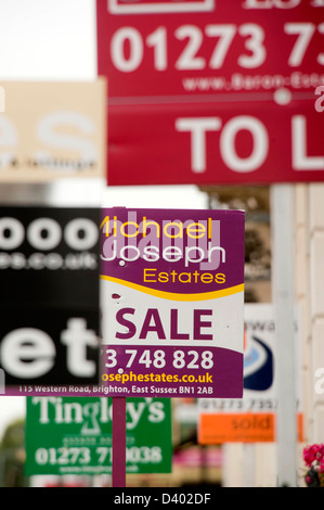 Sale boards in Brighton Stock Photo - Alamy