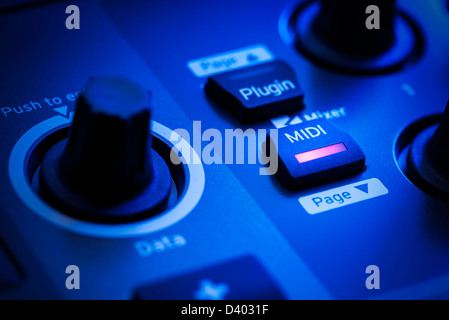 MIDI (Musical Instrument Digital Interface) cables on a white ...