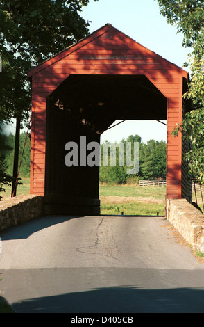 Covered bridge is timber-truss bridge with roof and siding which, in ...