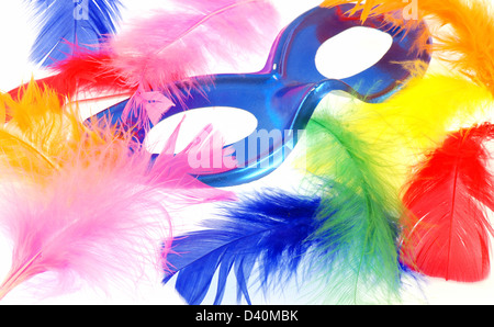 A lot of white feathers on a blue background. Light shades and ...