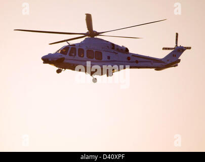 The helicopter carrying Pope Benedict XVI flies past St. Peter's ...