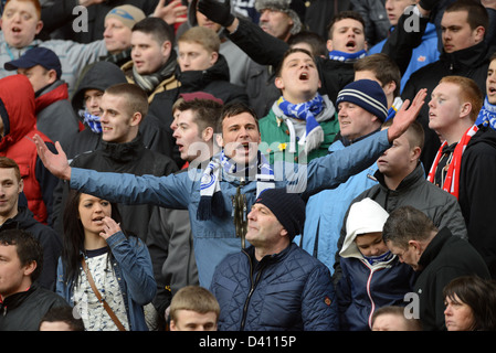 Welsh football supporters at Cardiff City Stadium, young fans wearing ...