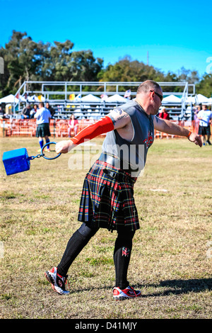 Male prepares to compete in the weight throw competition at the ...