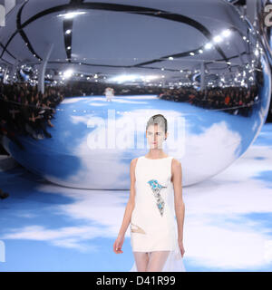 A model wears a creation as part of the Dior menswear Fall-Winter 2023 ...