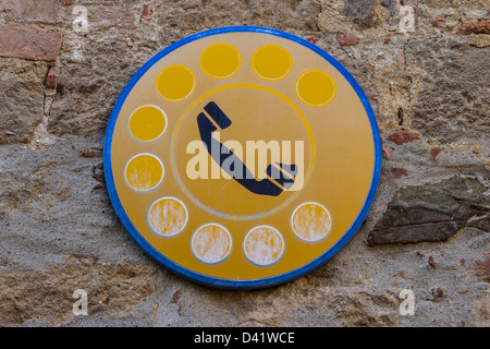 Old italian public telephone sign Stock Photo - Alamy