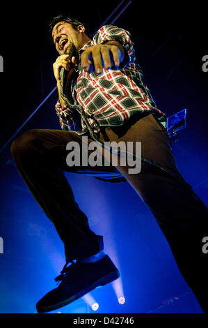 Chino Moreno, lead singer of the band the Deftones, performing on stage ...