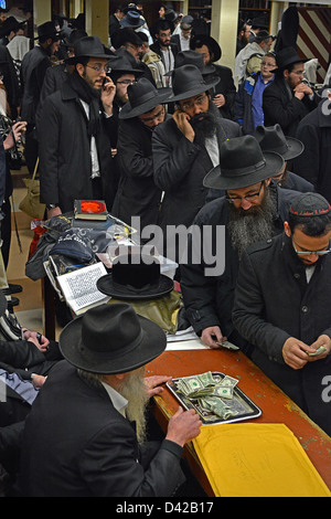 Machatzit HaShekel, the ritual of giving charity the day before the ...