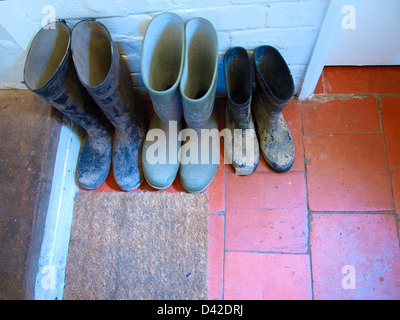 Parents and child dirty wellies Stock Photo - Alamy