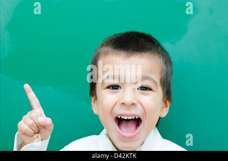 Little Boy Screaming Very Happy at Blackboard Stock Photo - Alamy