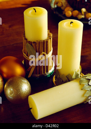 Christmas candle holder with cinnamon sticks, moss and anise stars ...