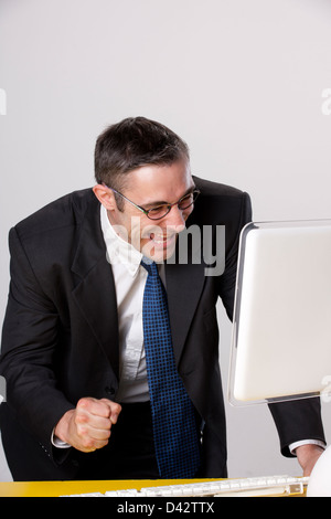 happy and successful businessman. photo in full growth Stock Photo - Alamy
