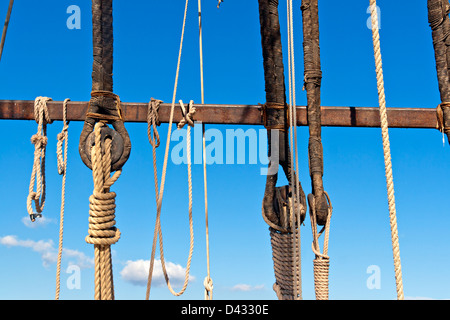 Detail of wooden block and tackle rigging on traditional ship during ...