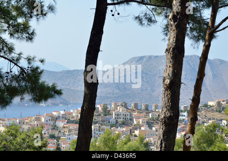 Views of the village of Chorio through Symiot pines; Chorio; Symi ...