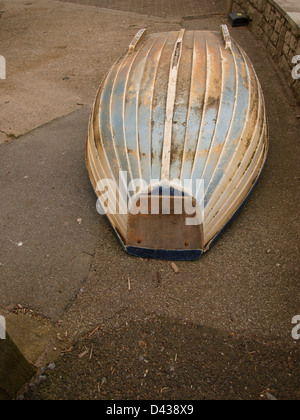 Upturned boat on dry land Stock Photo - Alamy