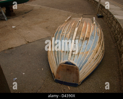 Upturned boat on dry land Stock Photo - Alamy