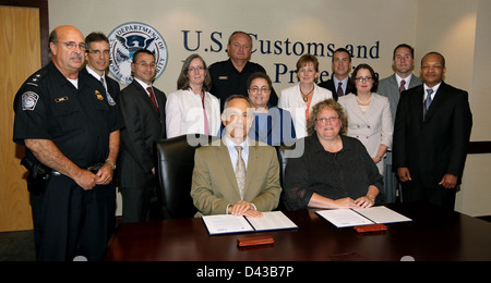 CBP Commissioner Alan Bersin and NTEU President Colleen Kelley sign a ...