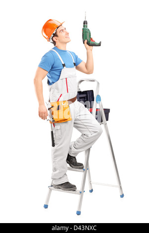 male worker is drilling the ceiling Stock Photo - Alamy