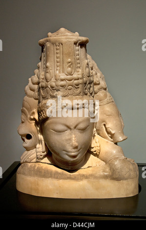 A four-headed statue of HIndu god Brahma in front of the Dhevasathan ...