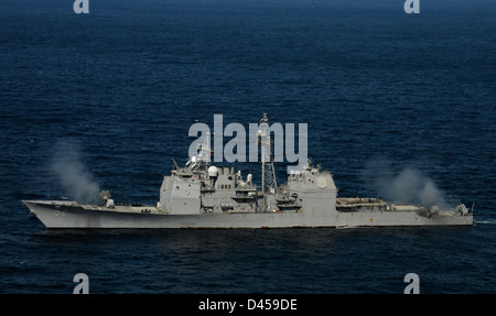 The USS Bunker Hill conducts a pre-action aim calibration fire exercise ...