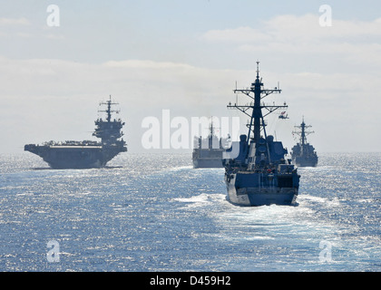 U.S. Navy ships conduct a replenishment at sea in the Pacific Ocean ...