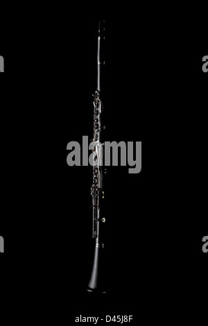 Detail of clarinet on sheet music background Stock Photo - Alamy