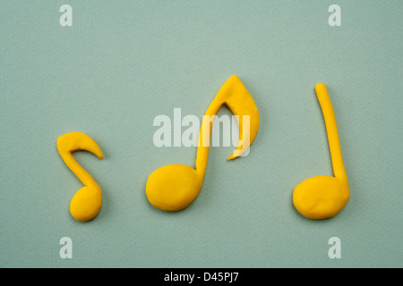 musical notes made in clay Stock Photo - Alamy