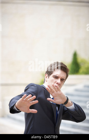 a western businessman with defending pose Stock Photo - Alamy