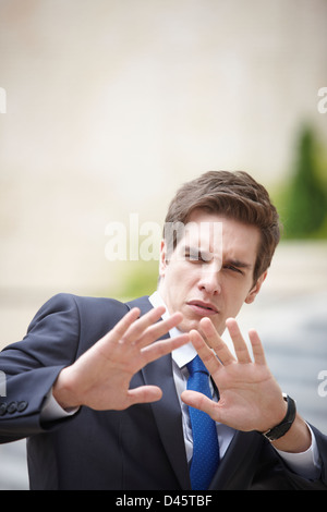 a western businessman with defending pose Stock Photo - Alamy