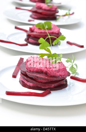 presentation of a foam beet between slices beet forming a yarrow Stock ...