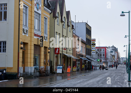 storgata main Tromso shopping street on a cold wet winter day troms ...