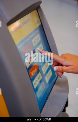 People looking at the itinerary sign board Schiphol Airport Stock Photo ...