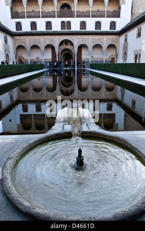 Palace of ancient Islam with fountains, arches and reflections in the ...