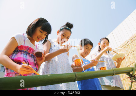 Children Enjoying the Flowing Somen Stock Photo - Alamy